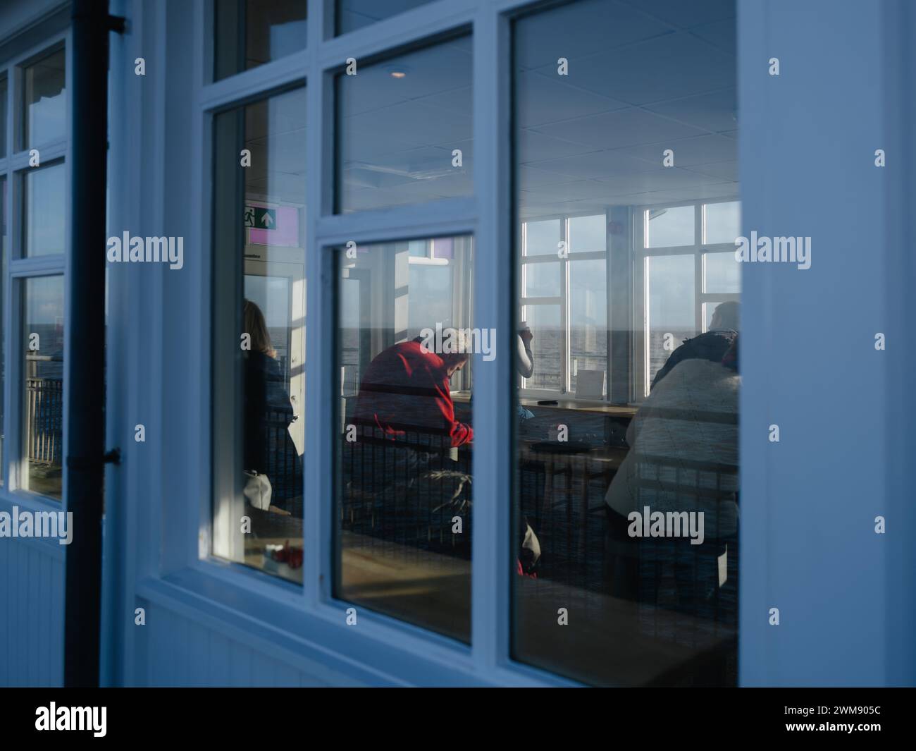 Man in red jumper hi-res stock photography and images - Alamy