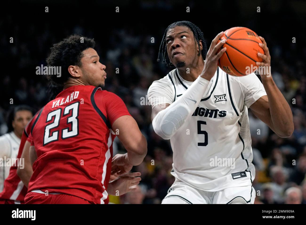 Central Florida forward Omar Payne (5) looks to shoot against Texas Tech forward Eemeli Yalaho ...