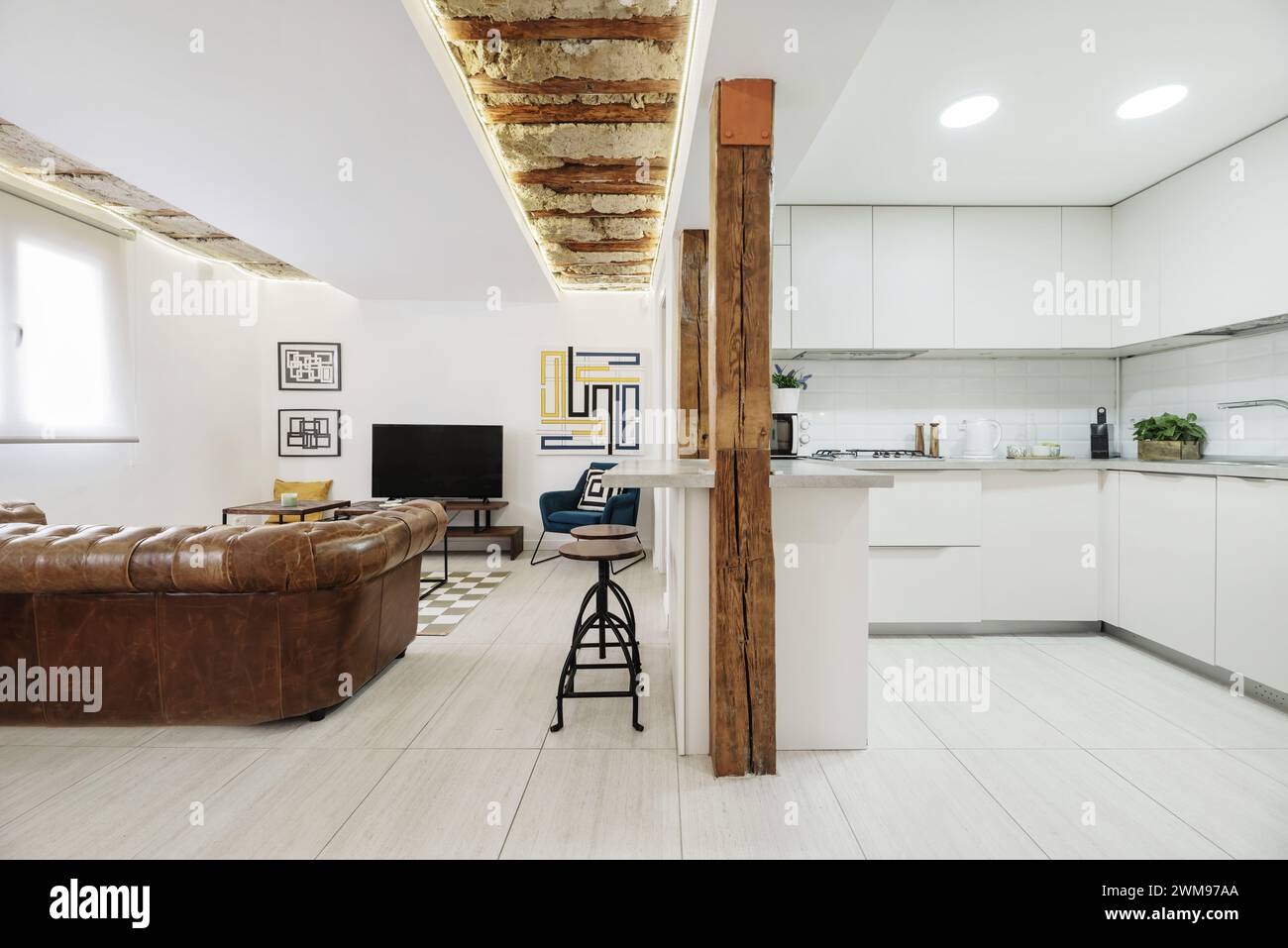 A nice loft apartment with contemporary design furniture and a large ...