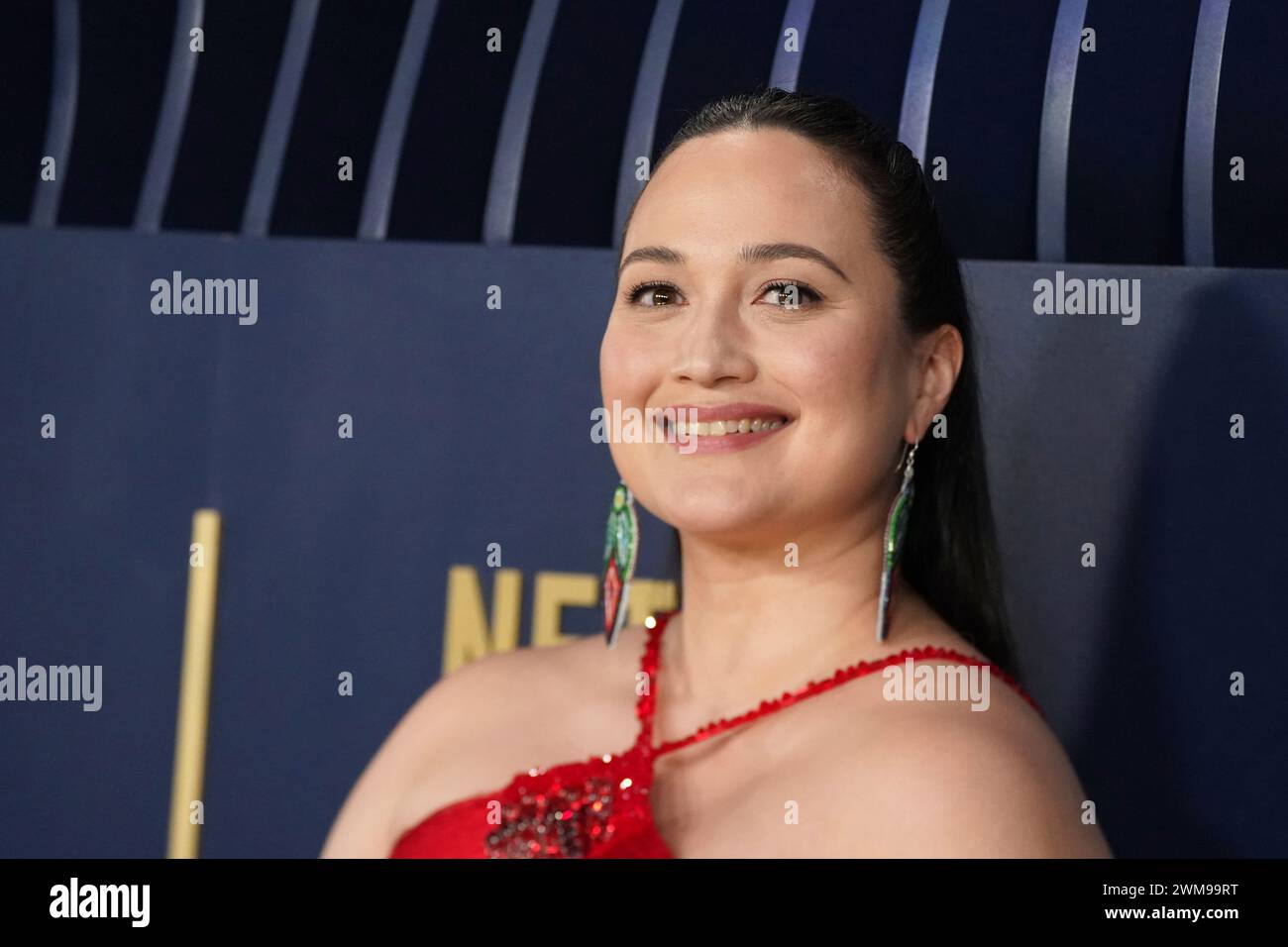 Lily Gladstone arrives at the 30th annual Screen Actors Guild Awards on ...
