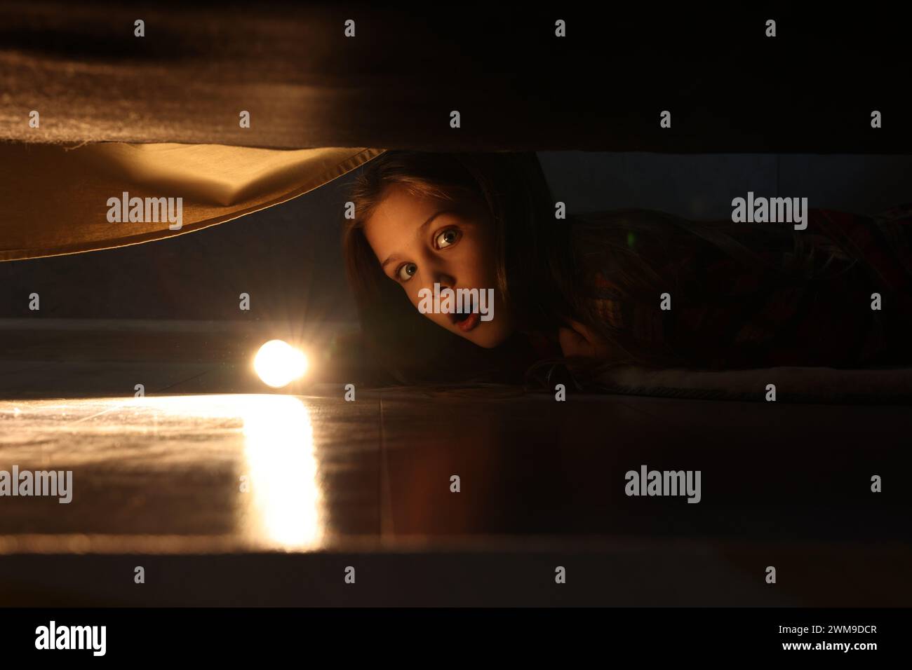 Child preteen flashlight bed hi-res stock photography and images - Alamy