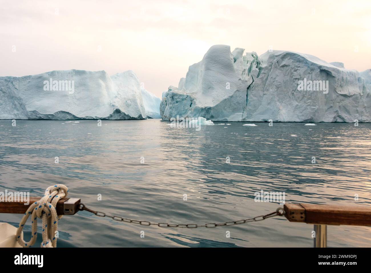 Sailing around the massive slabs of ice and icebergs of Illulisat's ...