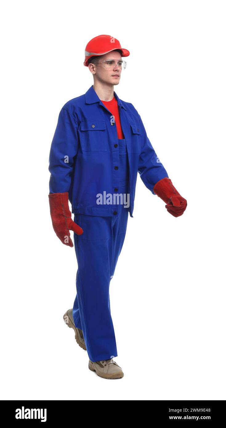 Young man wearing safety equipment on white background Stock Photo - Alamy