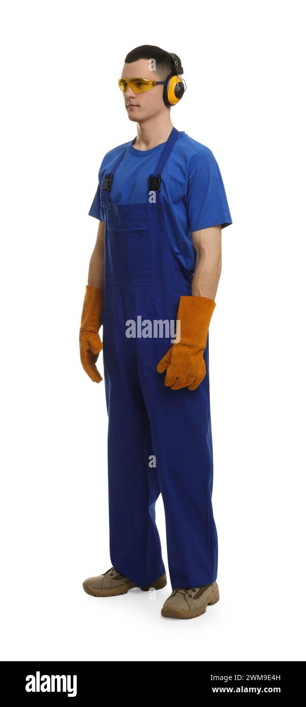 Young man wearing safety equipment on white background Stock Photo - Alamy