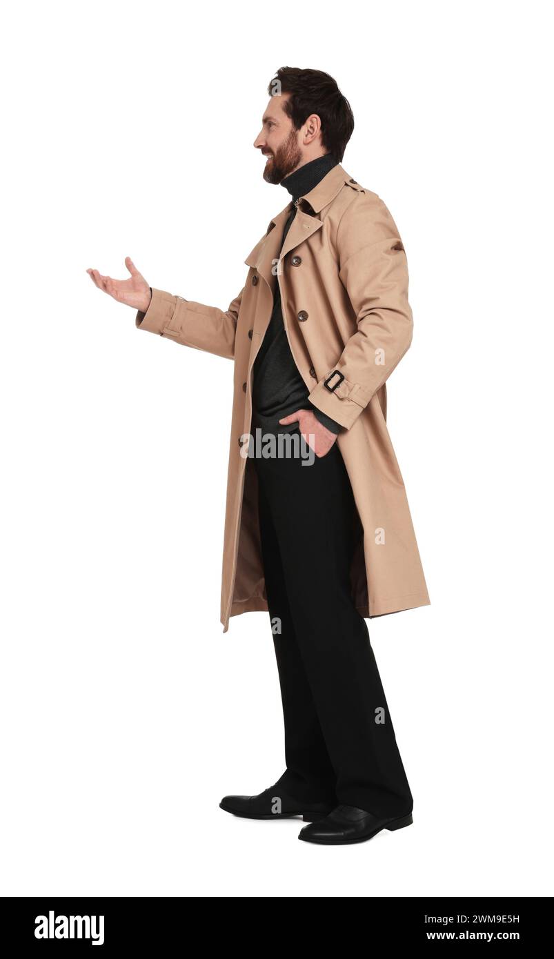 Handsome man greeting someone on white background Stock Photo - Alamy