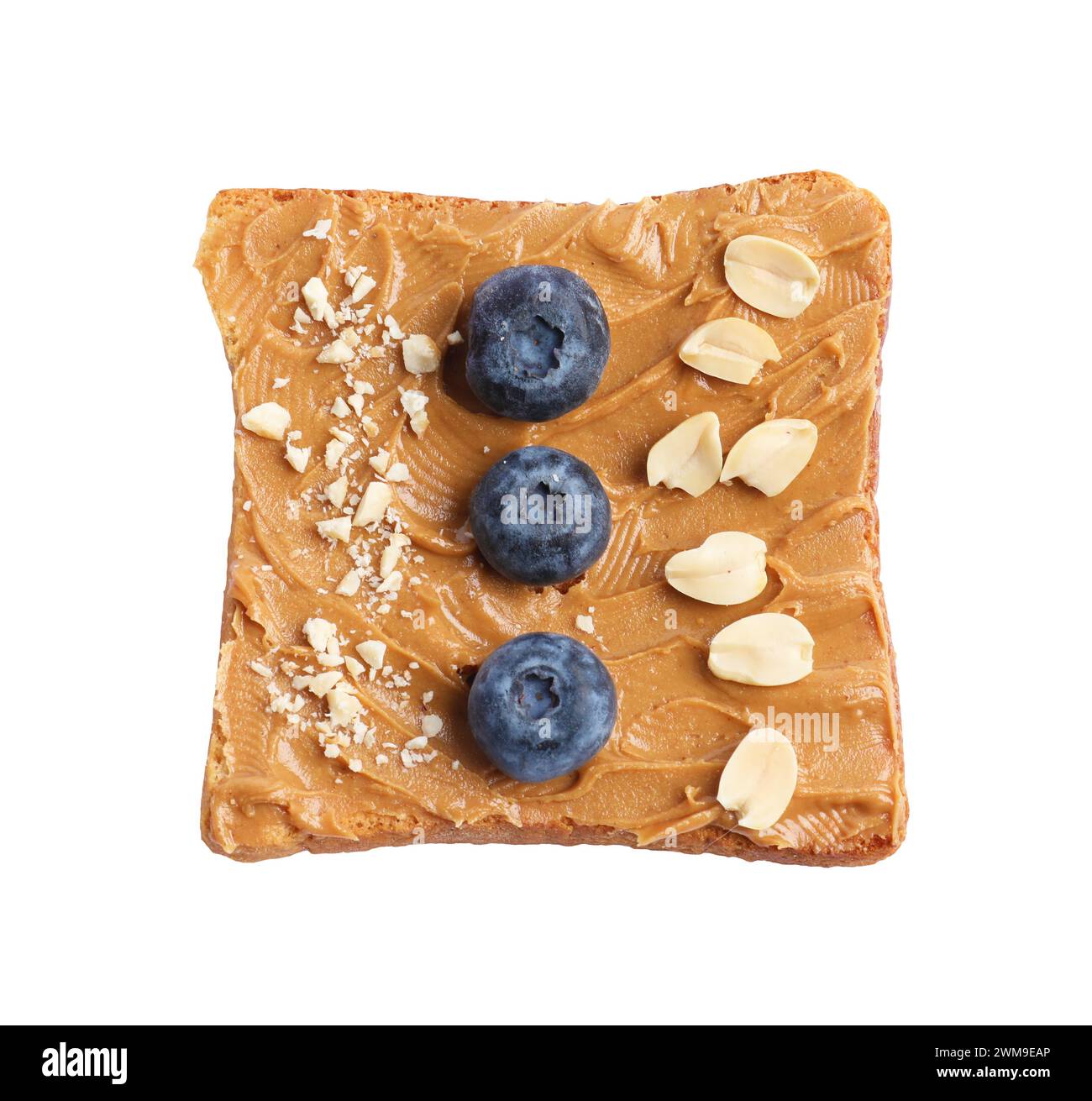 Toast with tasty nut butter, blueberries and nuts isolated on white ...