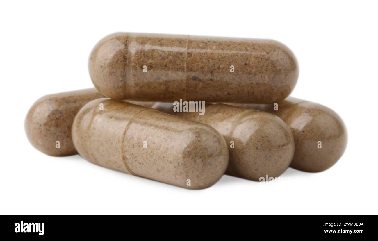 Pile of vitamin capsules isolated on white Stock Photo - Alamy
