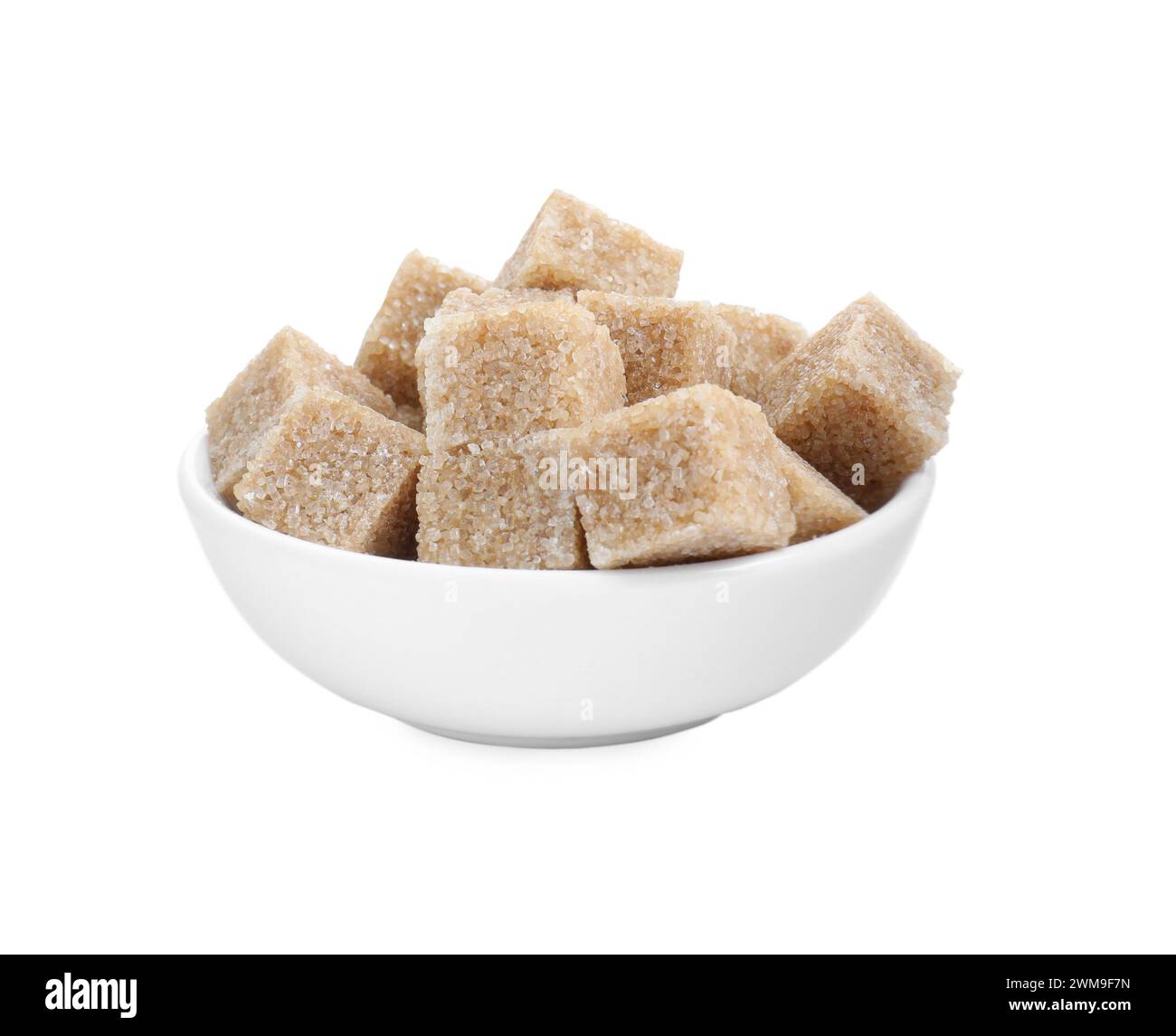 Brown sugar cubes in bowl isolated on white Stock Photo - Alamy