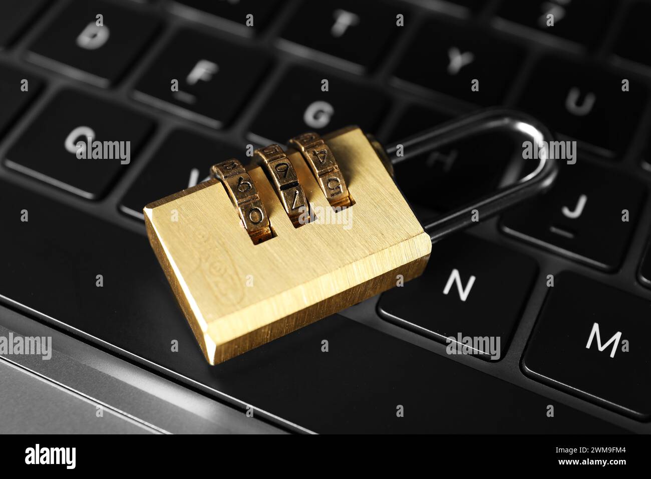 Cyber security. Padlock on laptop, closeup view Stock Photo - Alamy