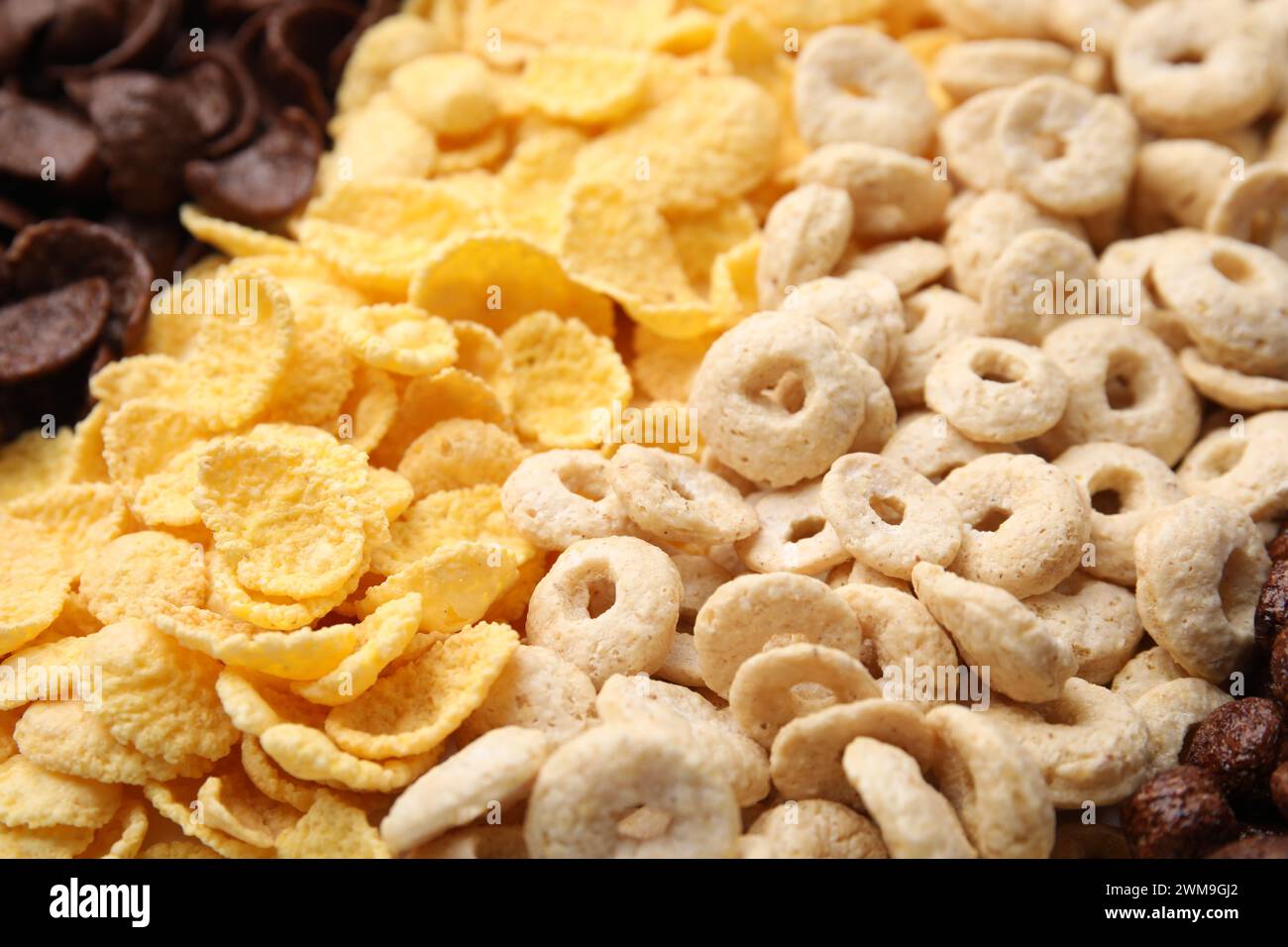 Different types of breakfast cereals as background, closeup Stock Photo ...