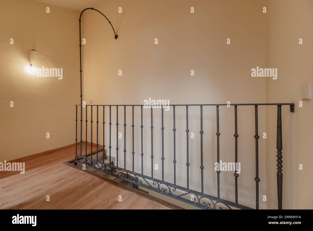Interior staircase of a duplex residential house with gray tile steps ...