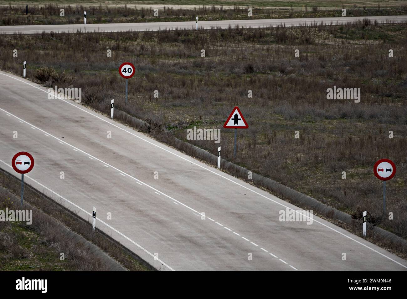 A small stretch of road with one lane in each direction and with quite ...