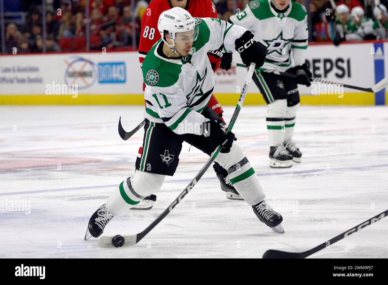 Dallas Stars' Logan Stankoven (11) shoots the puck against the Carolina ...