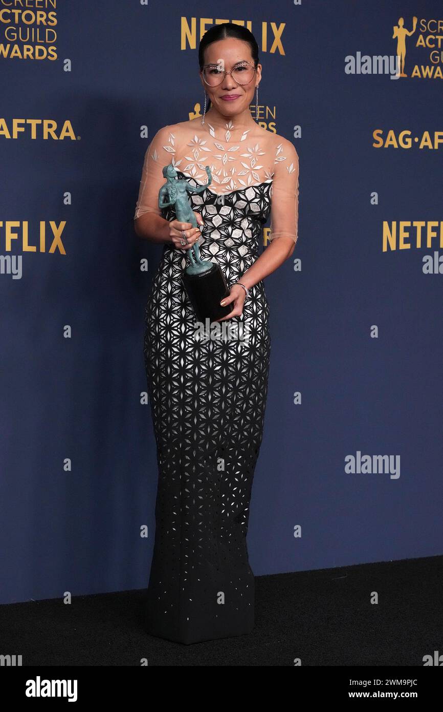 Ali Wong poses in the press room with the award for outstanding ...