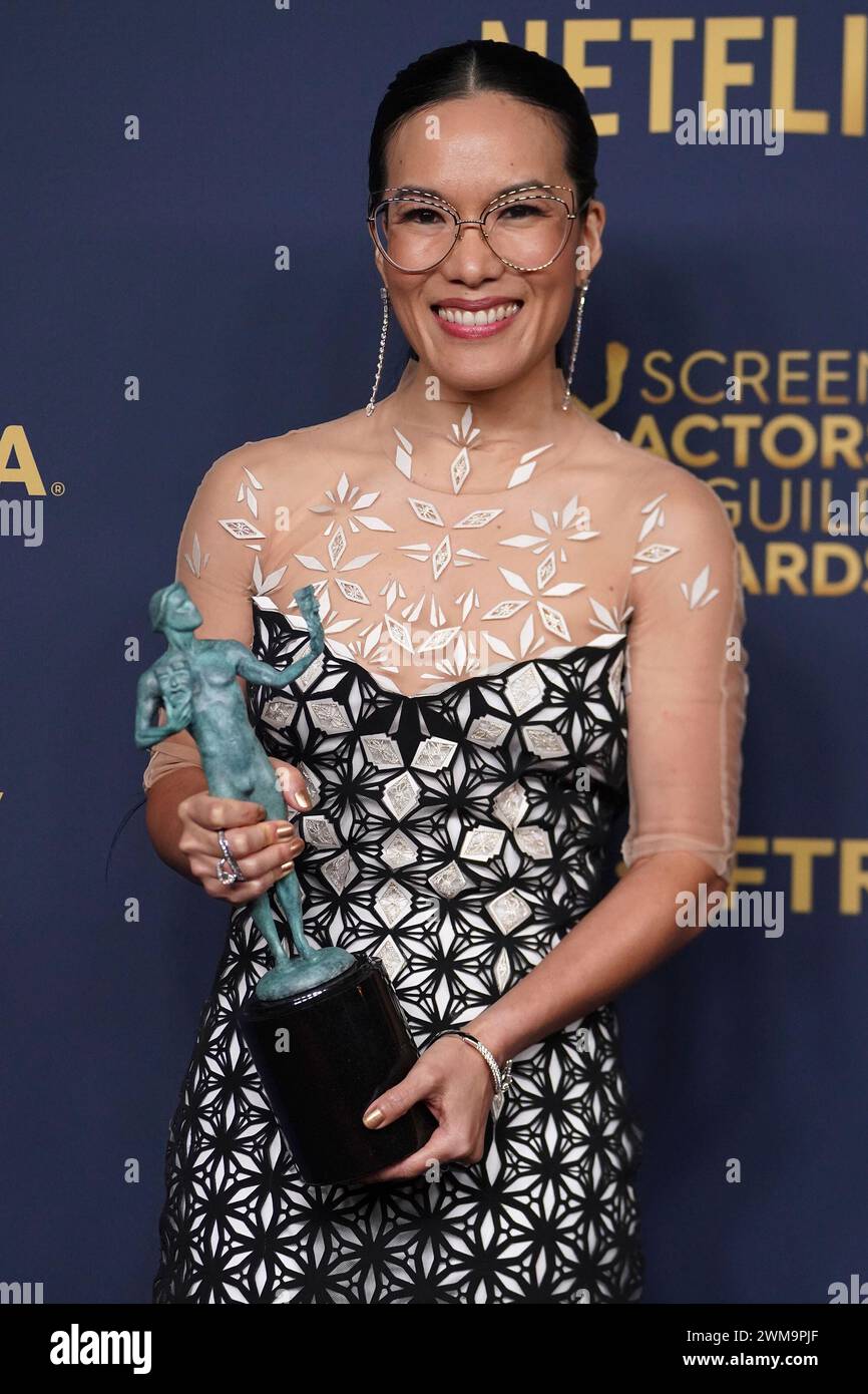 Ali Wong poses in the press room with the award for outstanding ...