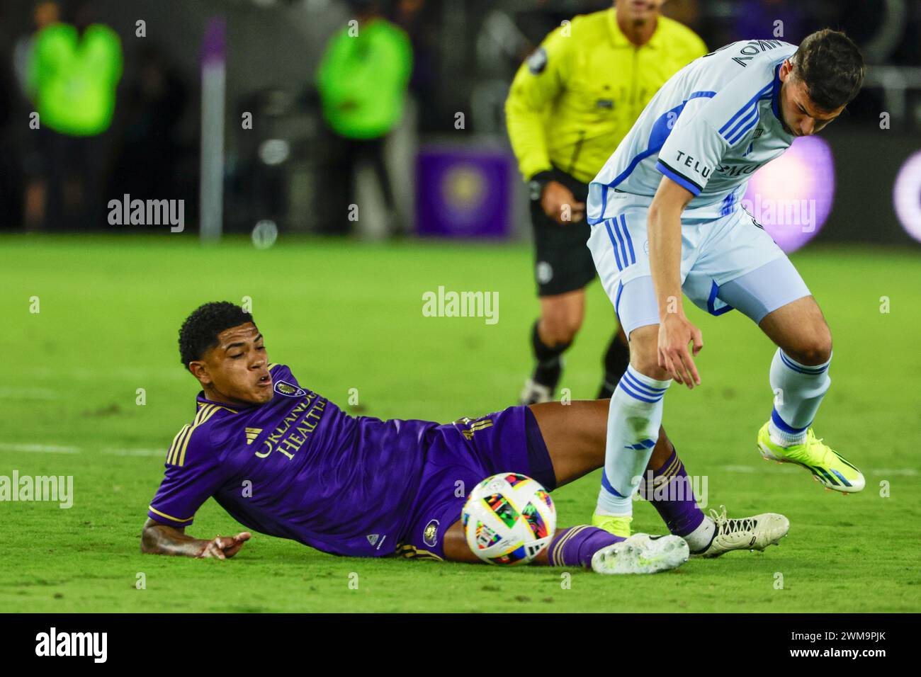 Orlando City midfielder Wilder Cartagena, left, defends against CF ...