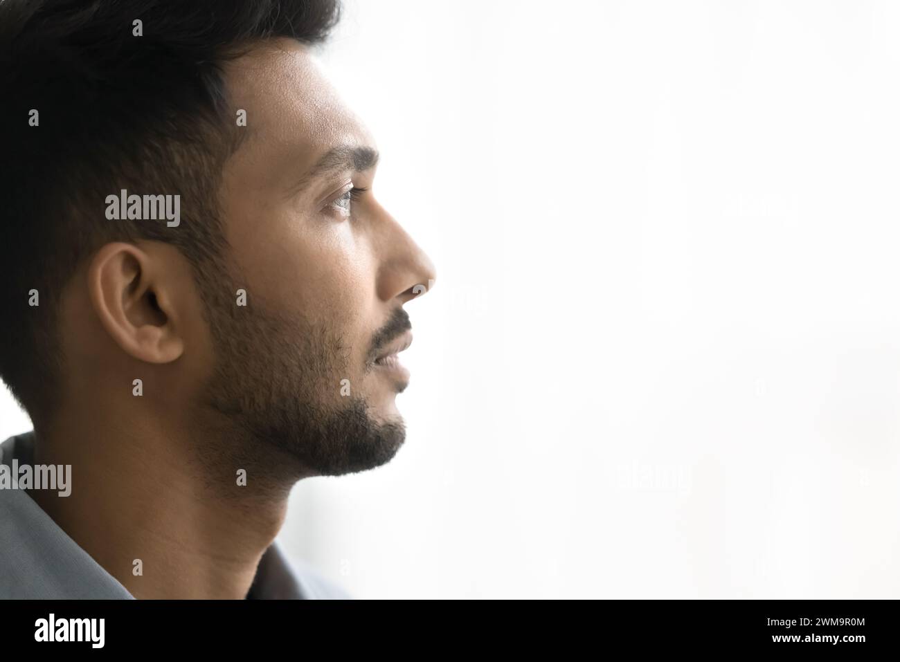 Side profile indian thoughtful man hi-res stock photography and images ...