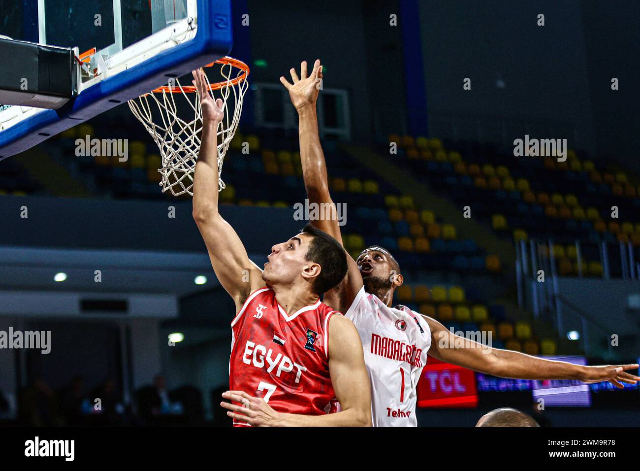 Cairo, Egypt. 24th Feb, 2024. Youssef Mohamed Helmy (L) of Egypt goes ...