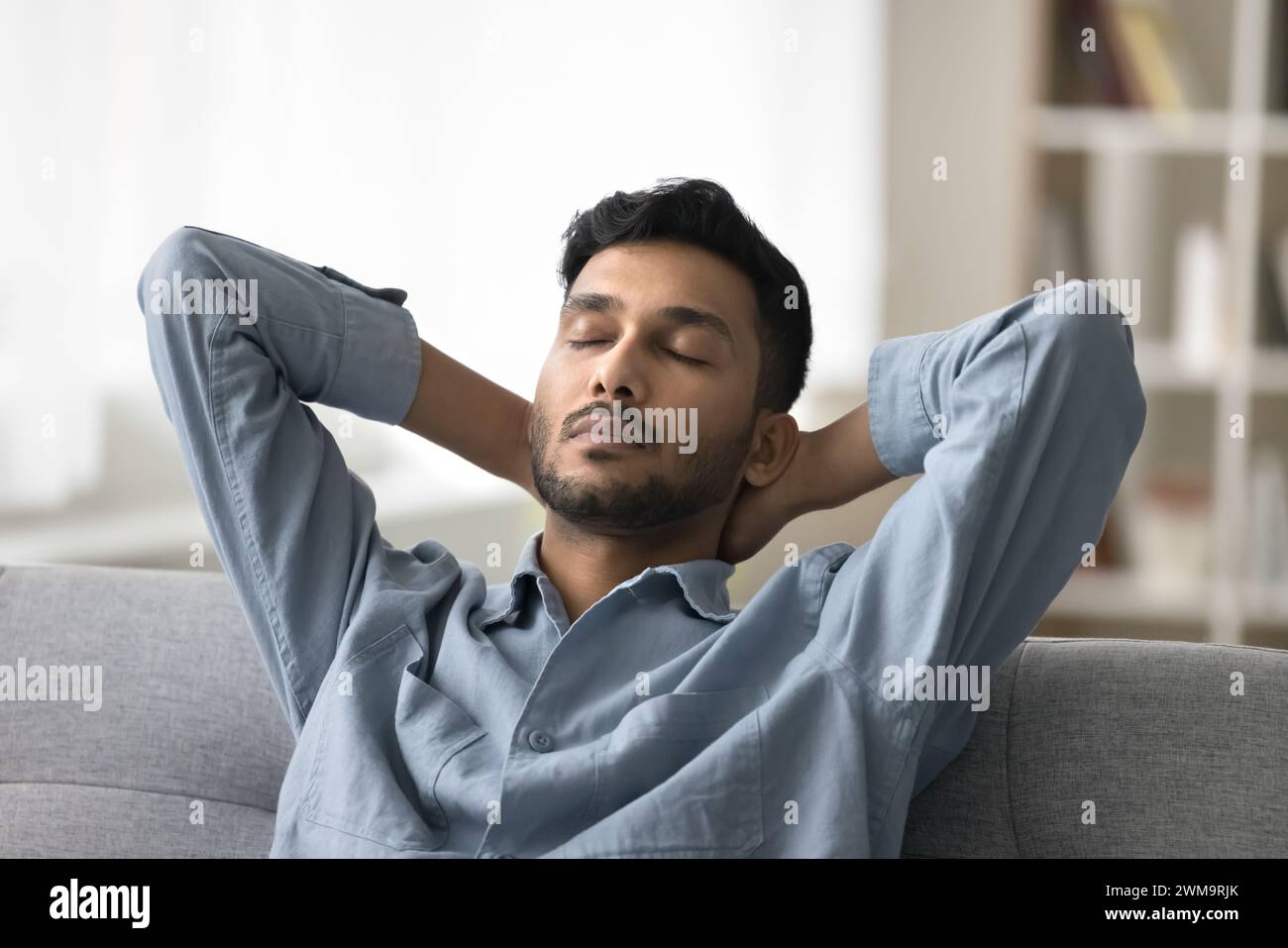 Indian man relaxing hands behind hi-res stock photography and images ...
