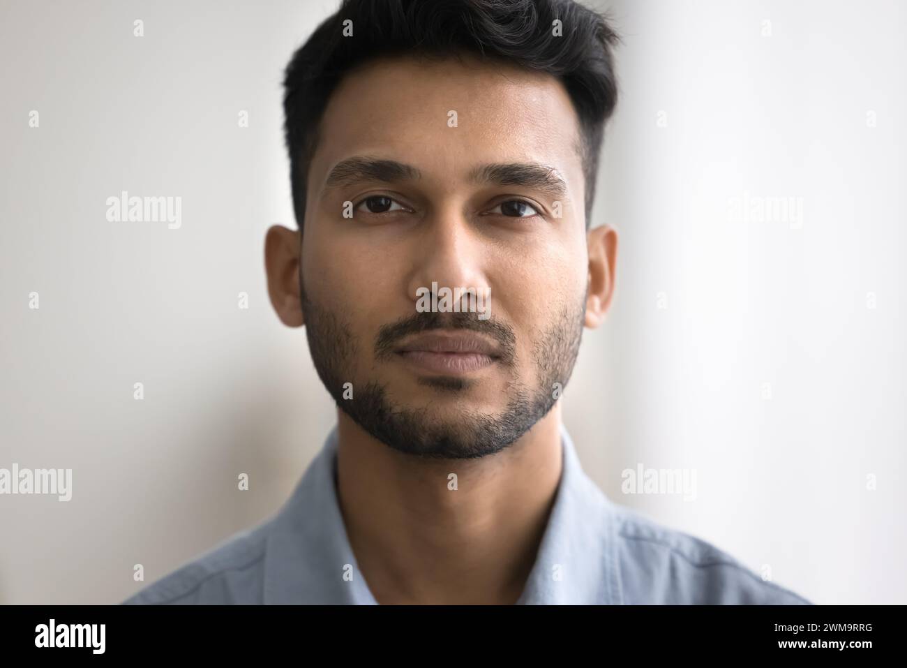 Closeup portrait of serious Indian bearded guy Stock Photo - Alamy