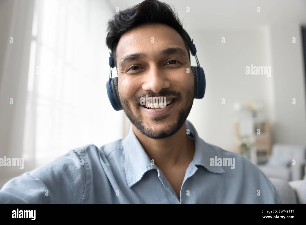 Indian man smile looking at smartphone camera make video call Stock ...