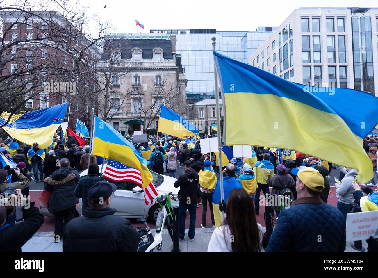 Ukrainians and their supporters march in front of the Russian ...