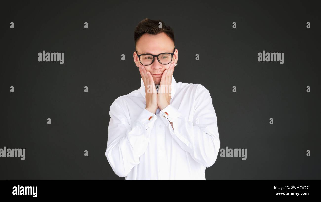 Flattered expression pleasant surprise happy guy Stock Photo - Alamy