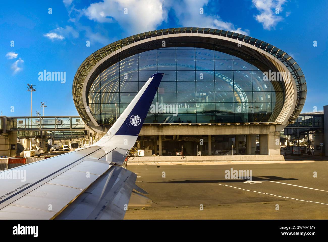 Taxiing on an Air France jet before the architecturally modern Terminal ...