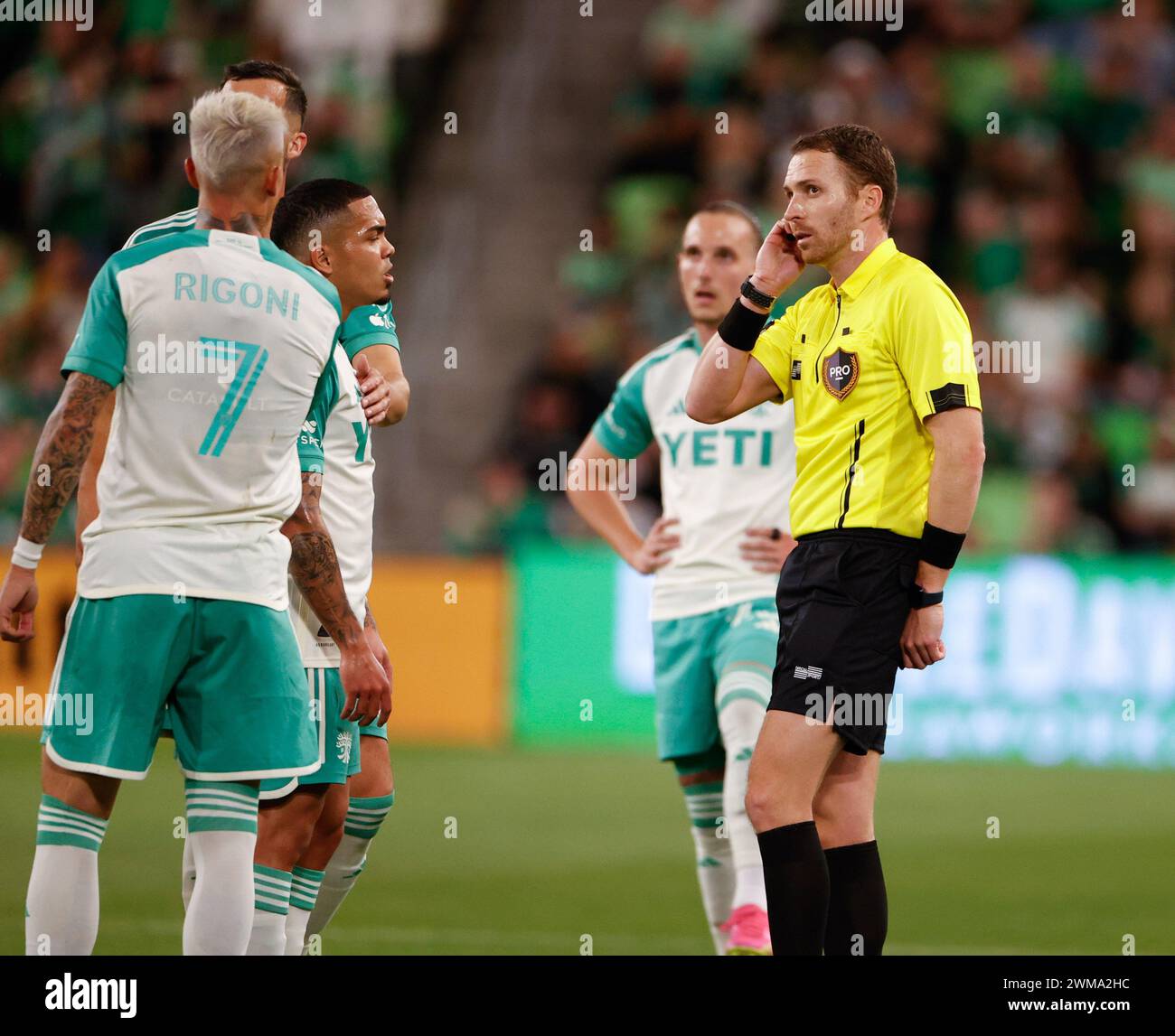 February 24, 2024: Referee TREVOR WISEMAN checks in with the VAR ...