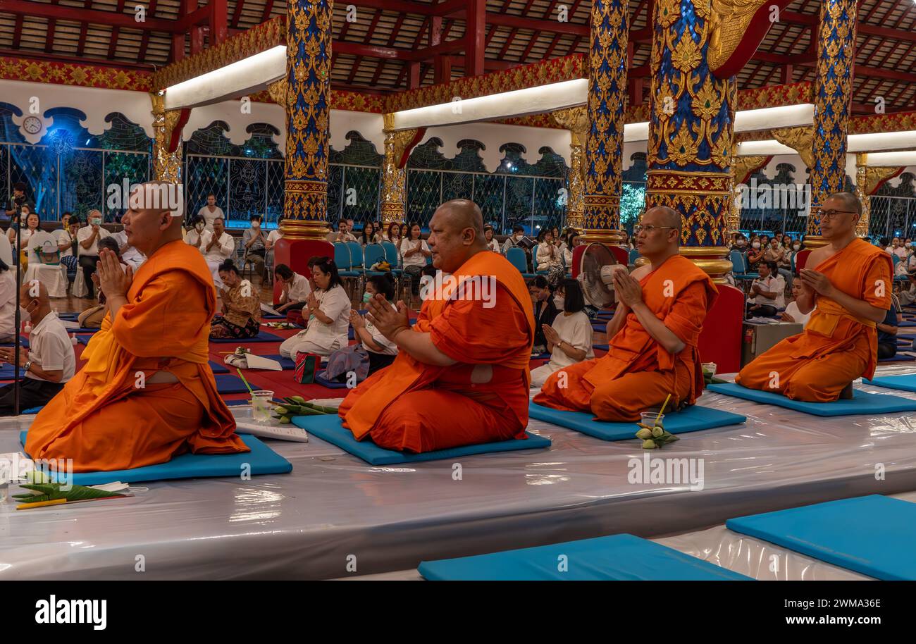 Local people and Buddhist monks celebrating the Magha Puja full moon ...