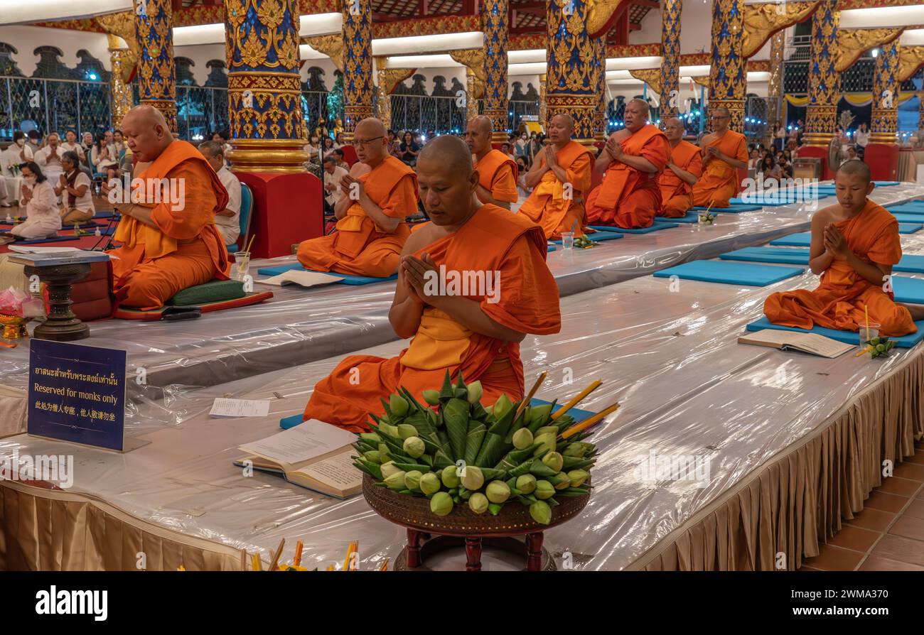 Local people and Buddhist monks celebrating the Magha Puja full moon festival at the Wat Suan ...