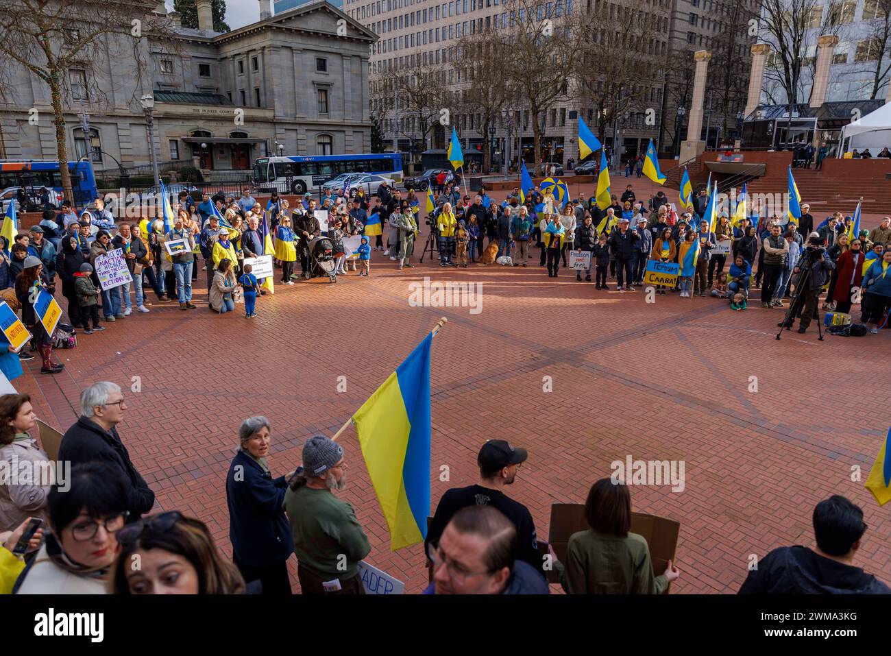 Portland, USA. 24th Feb, 2024. Hundreds of people rallied in Pioneer ...