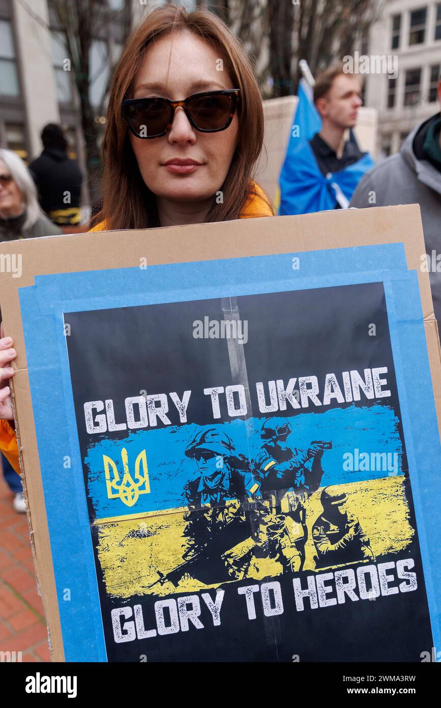 Portland, USA. 24th Feb, 2024. Two standard alutes in Ukrainian, "Slava ...