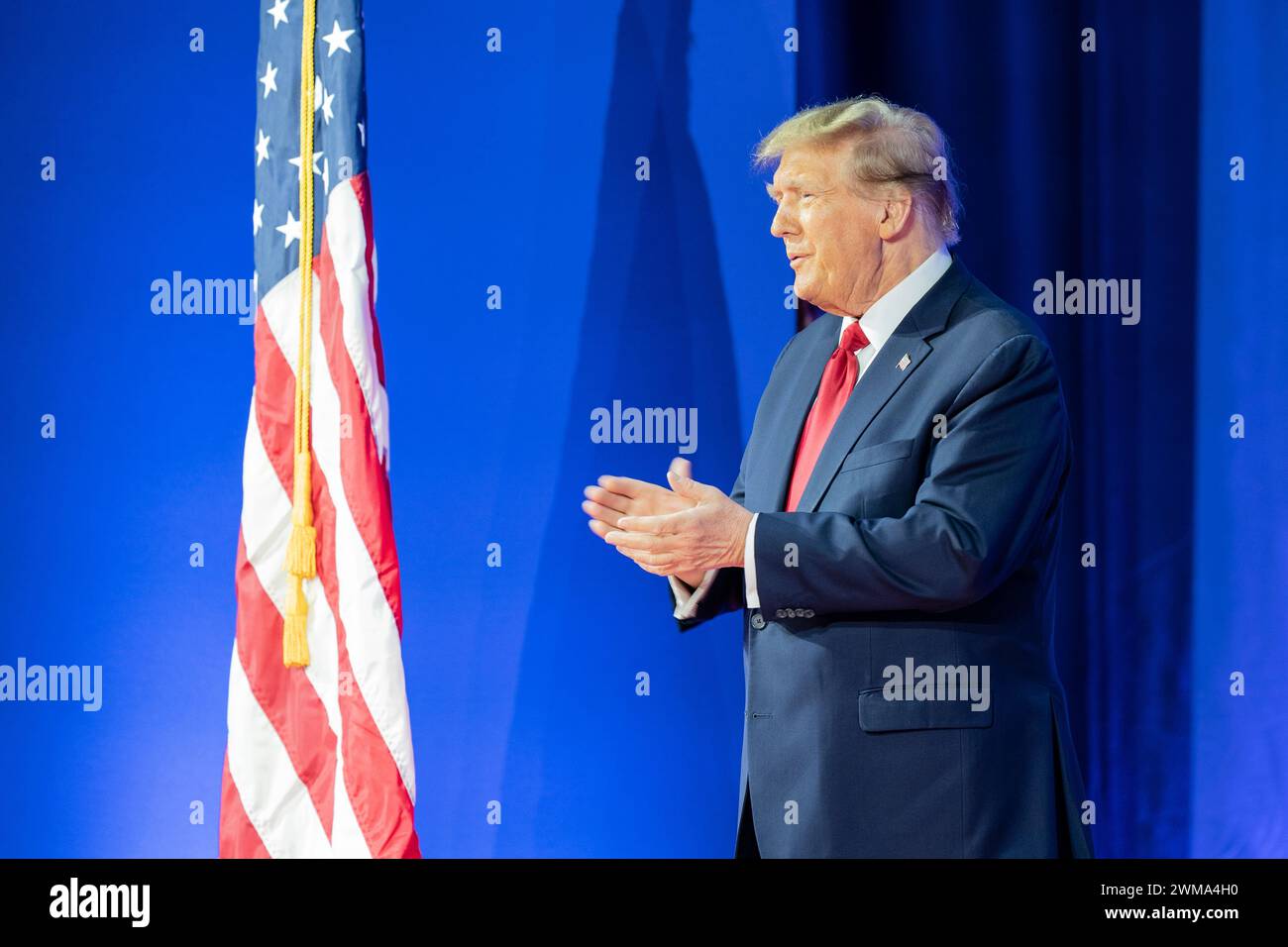 Former President Donald J. Trump arrives on stage during CPAC Conference 2024 at Gaylord ...