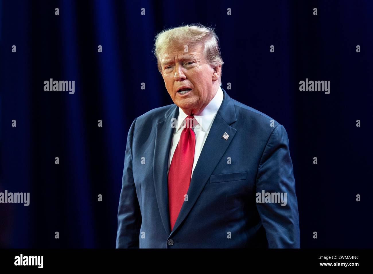 Former President Donald J. Trump arrives on stage during CPAC ...