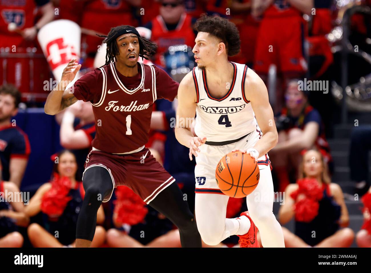Dayton guard Koby Brea, right, drives in front of Fordham guard Will ...