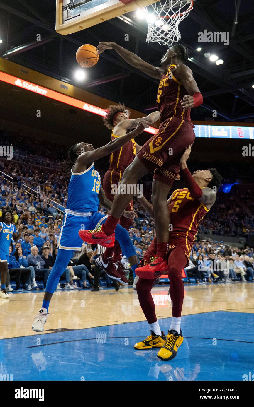 Southern California forward Vincent Iwuchukwu (3) blocks a shot by UCLA ...