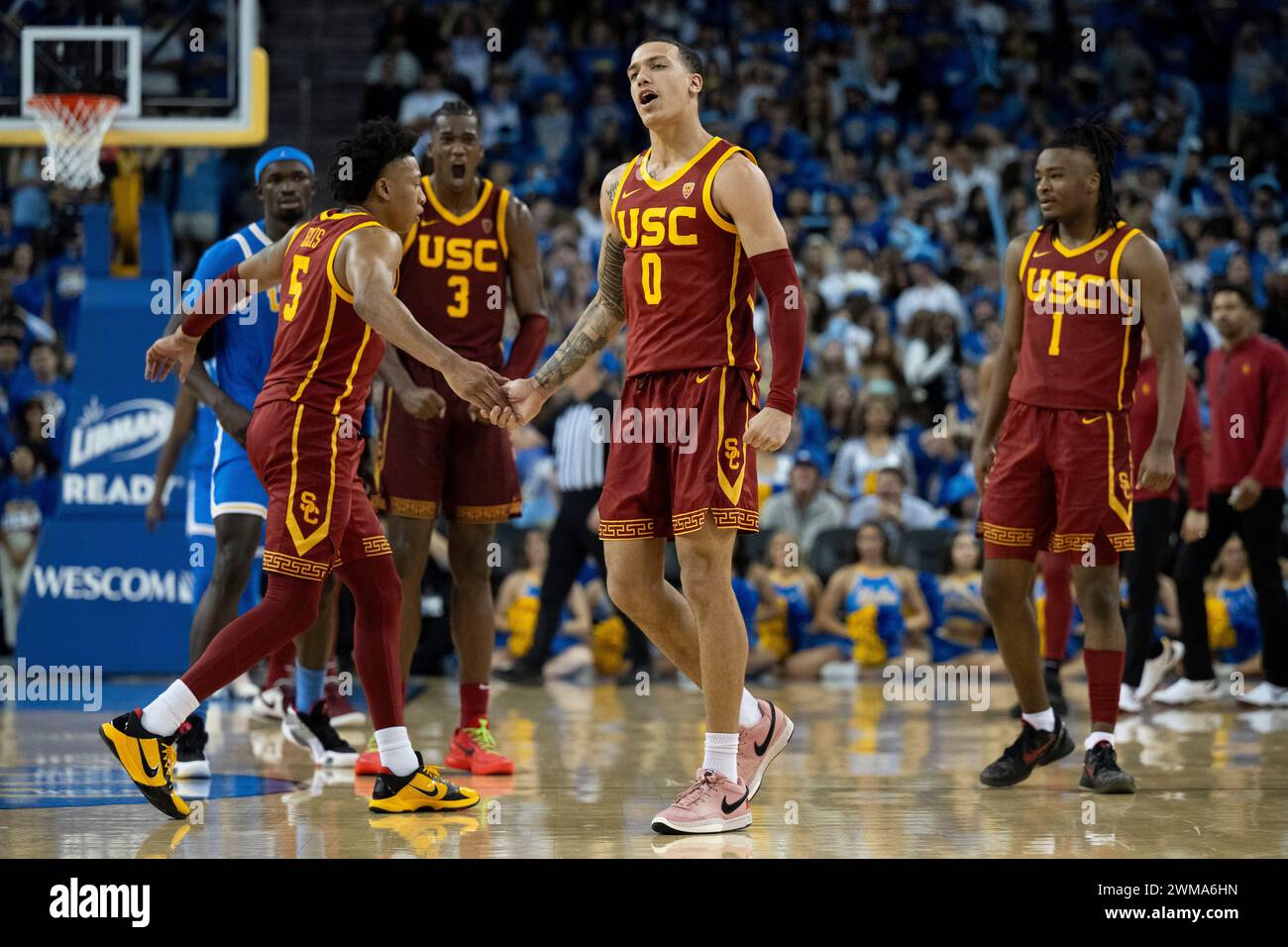Southern California guard Kobe Johnson (0) celebrates his basket ...