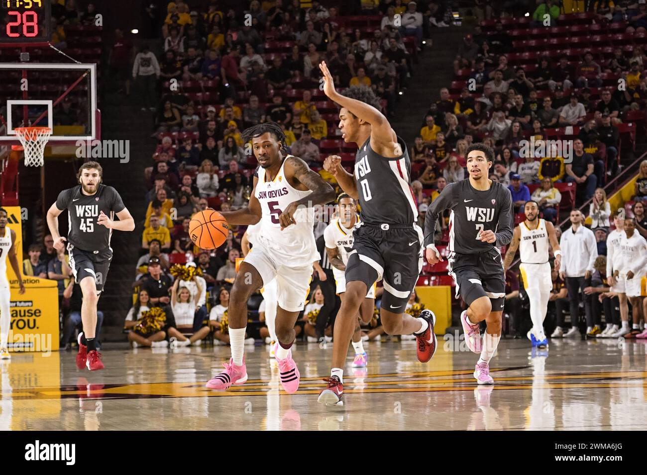 Arizona State Sun Devils guard Jamiya Neal (5) drives toward the basket ...