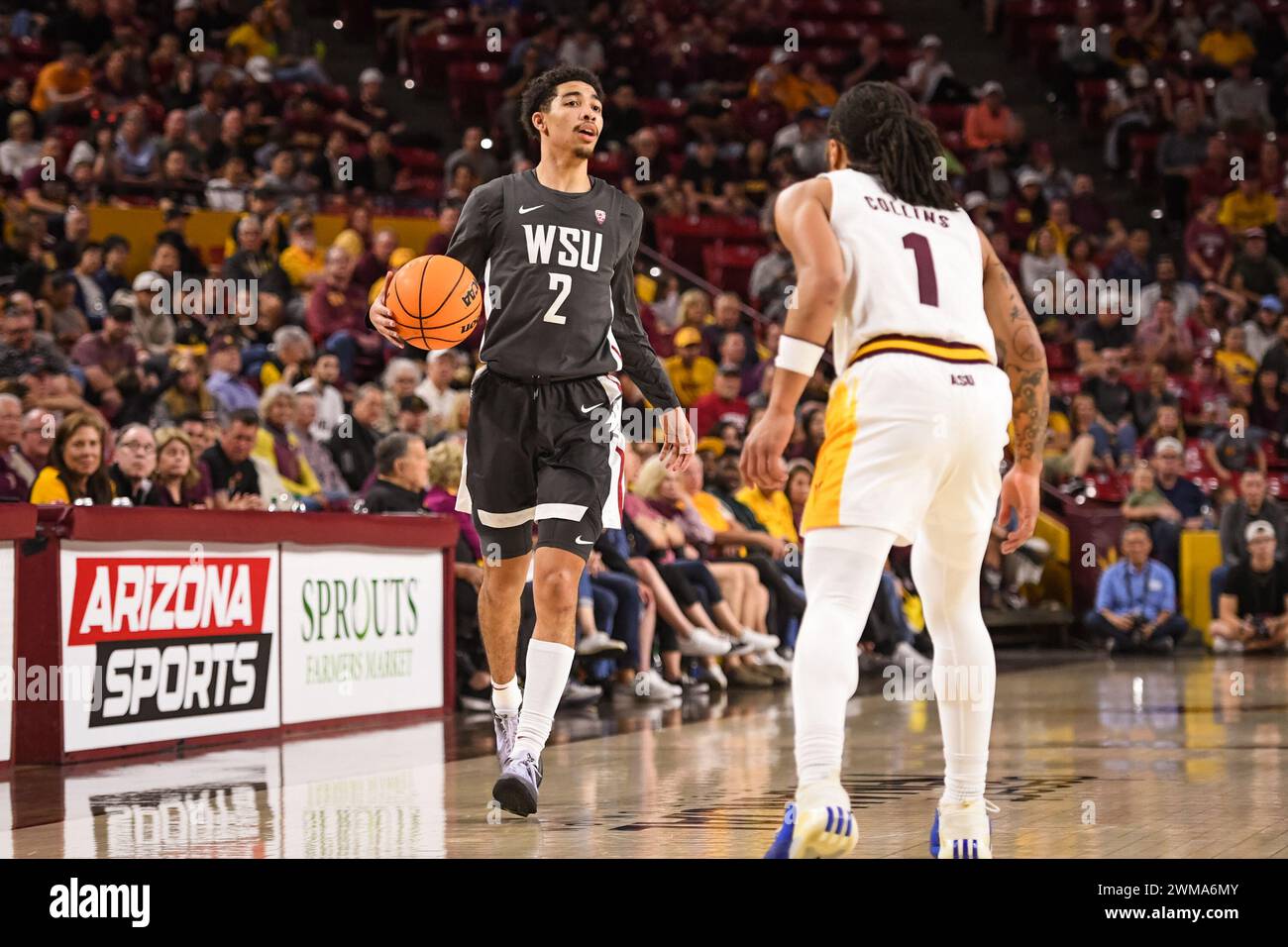 Washington State Cougars guard Myles Rice (2) looks to pass the ball in ...