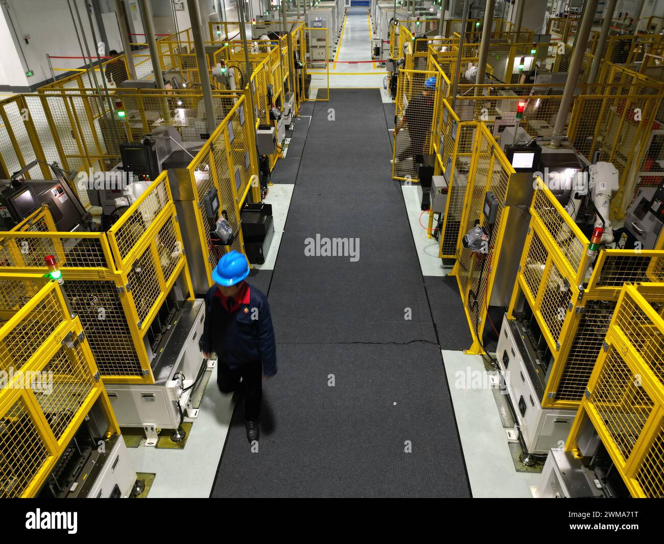 KUNSHAN, CHINA - FEBRUARY 21, 2024 - Technicians are debugging ...