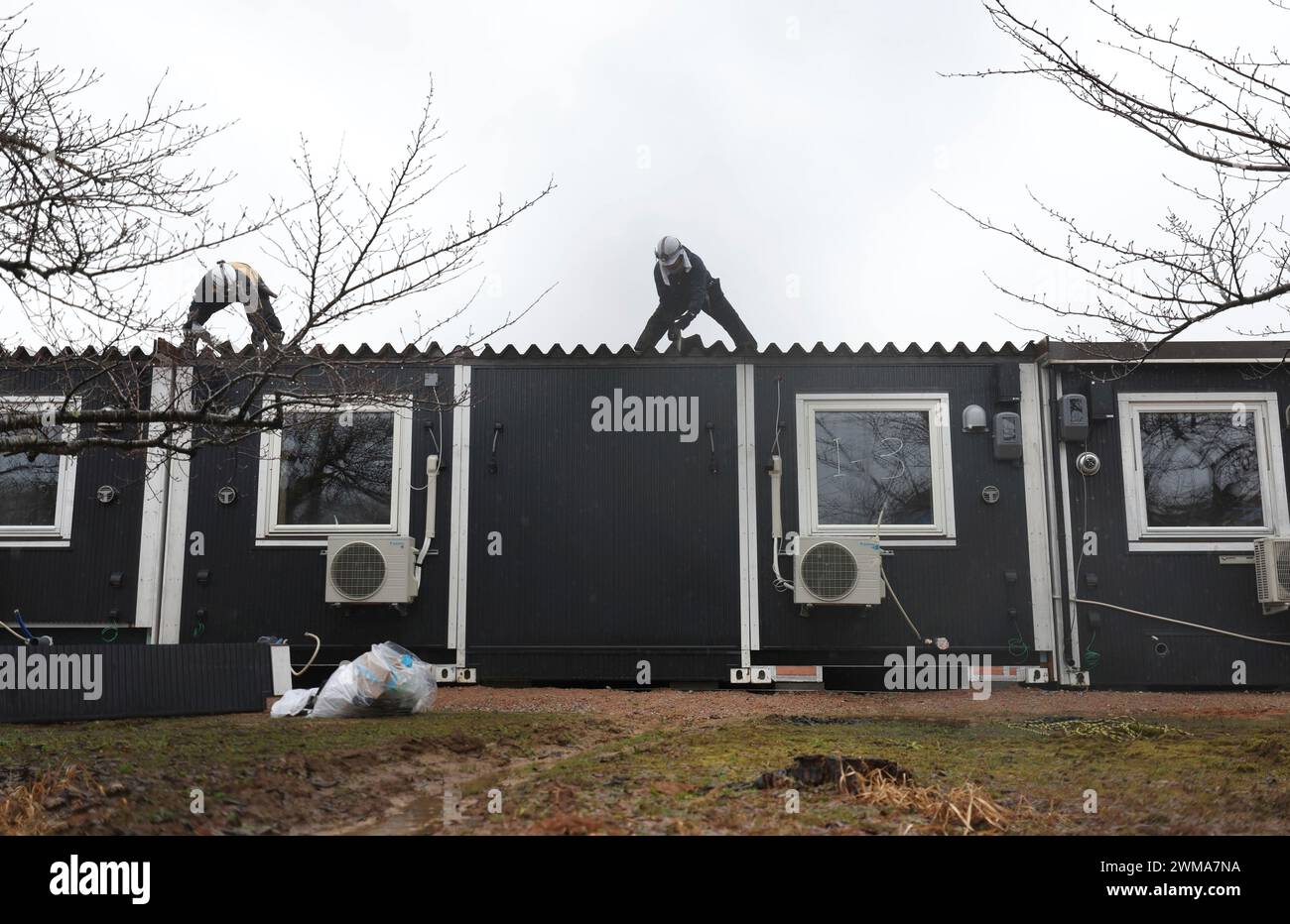 The construction work of temporary housings continues at a disaster ...