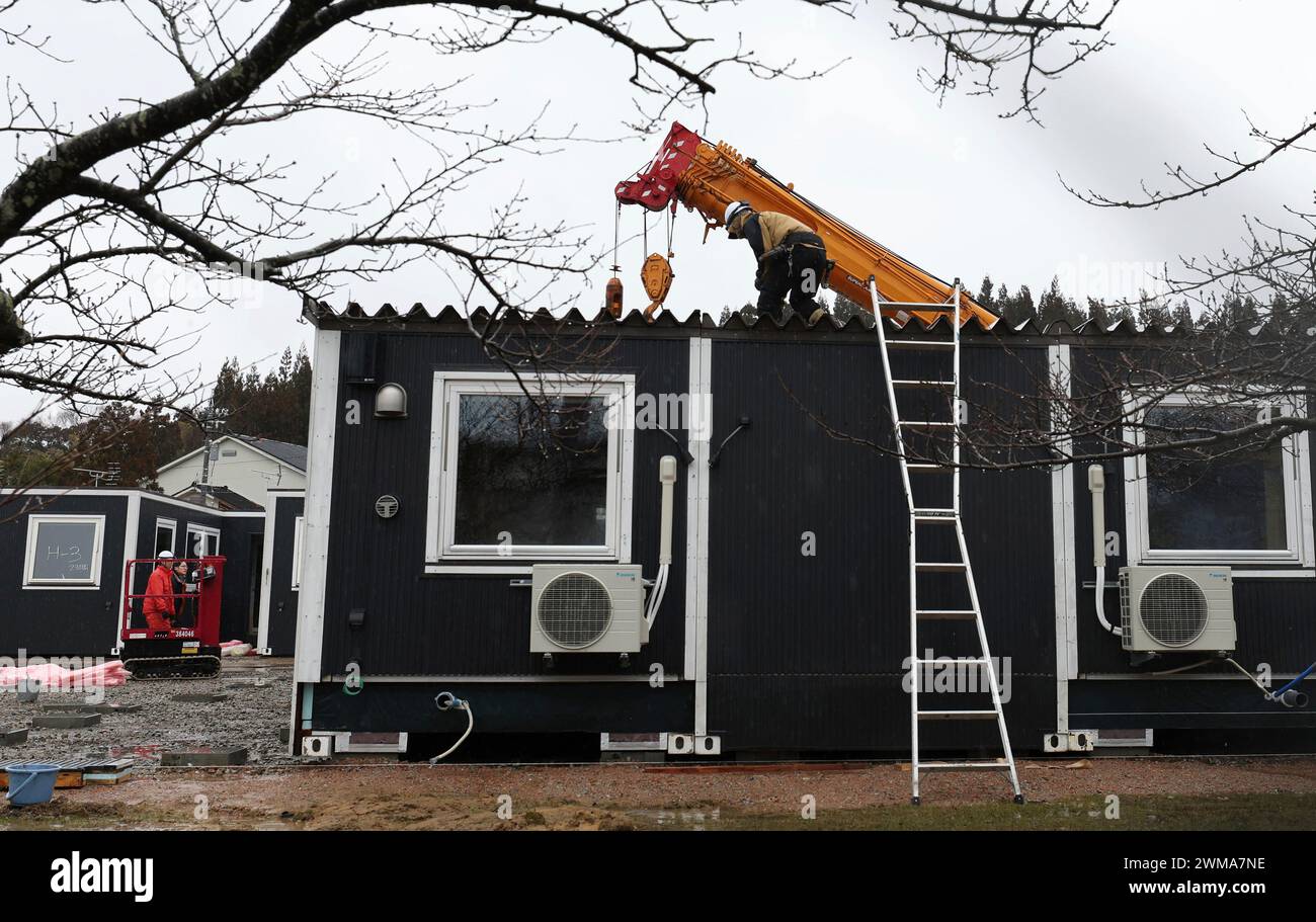 The construction work of temporary housings continues at a disaster ...