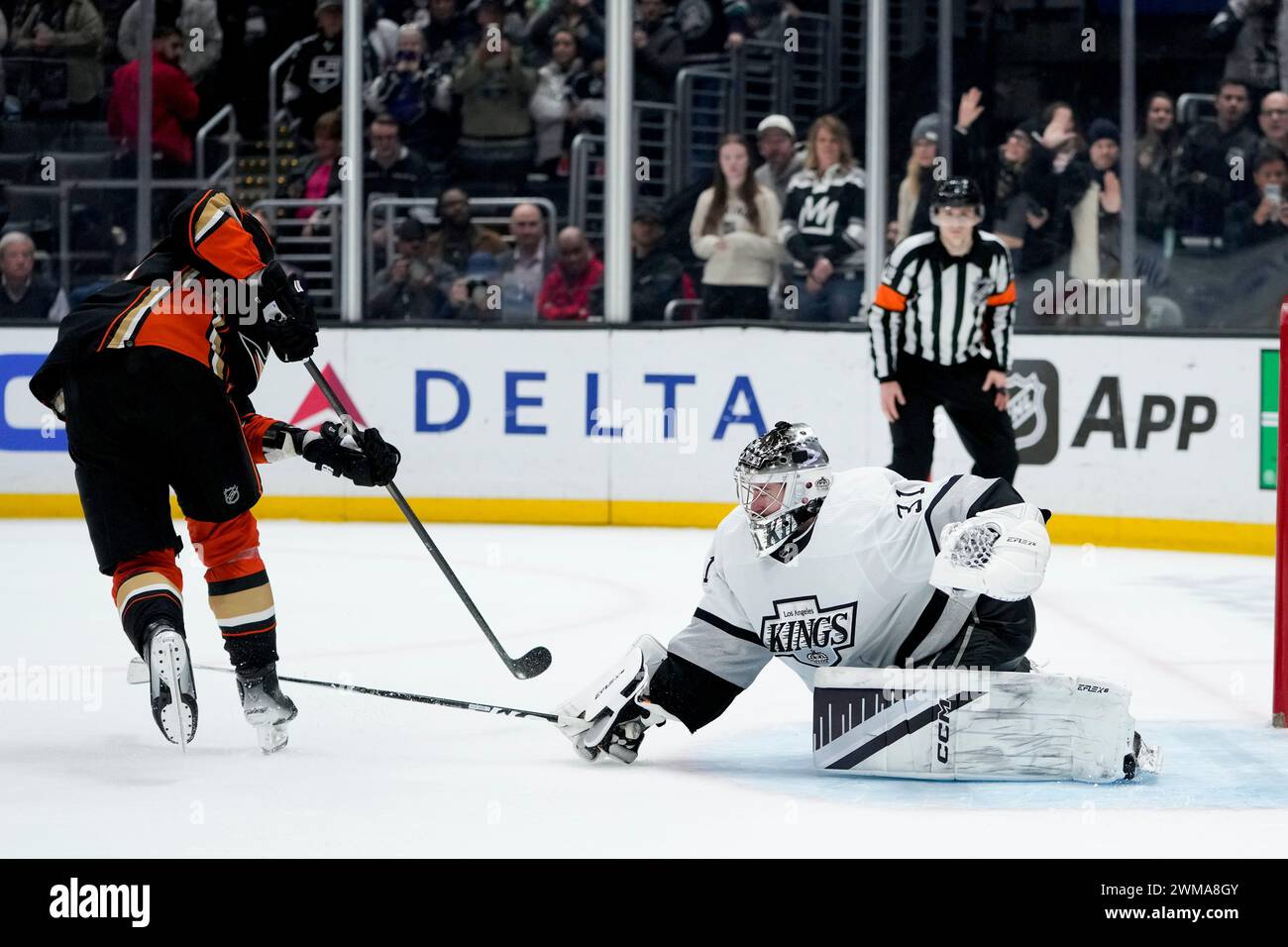 Los Angeles Kings goaltender David Rittich, right, blocks a shot by ...
