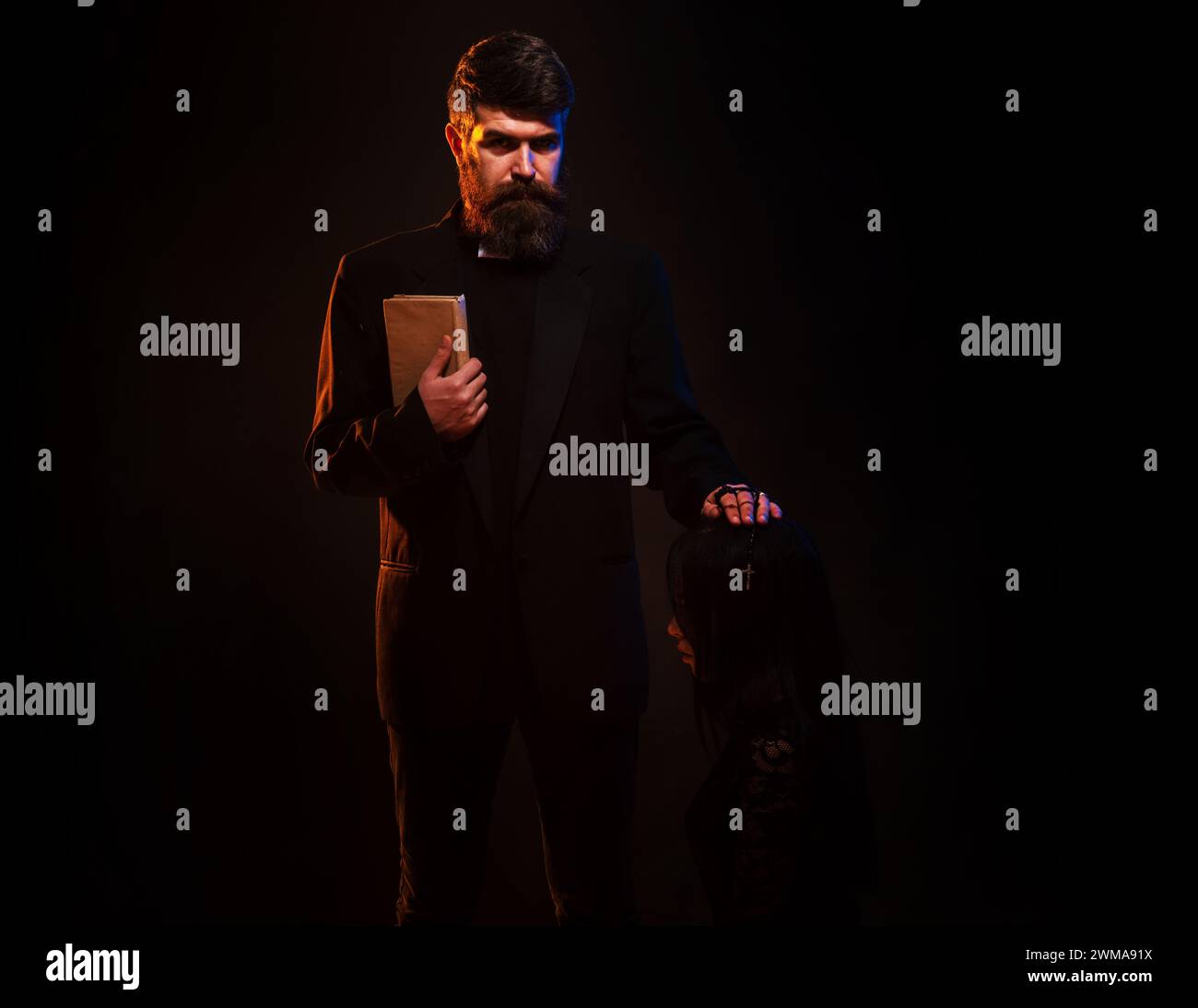 Priest blesses a young woman. Religion holy. Priest sin. Church Pastor ...