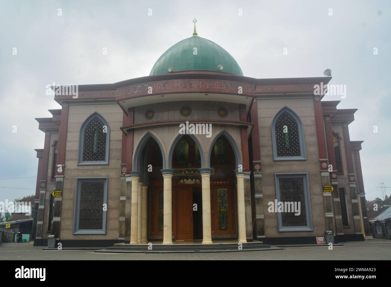 The exterior of a mosque in Wonosobo, Indonesia. mas is a place of ...