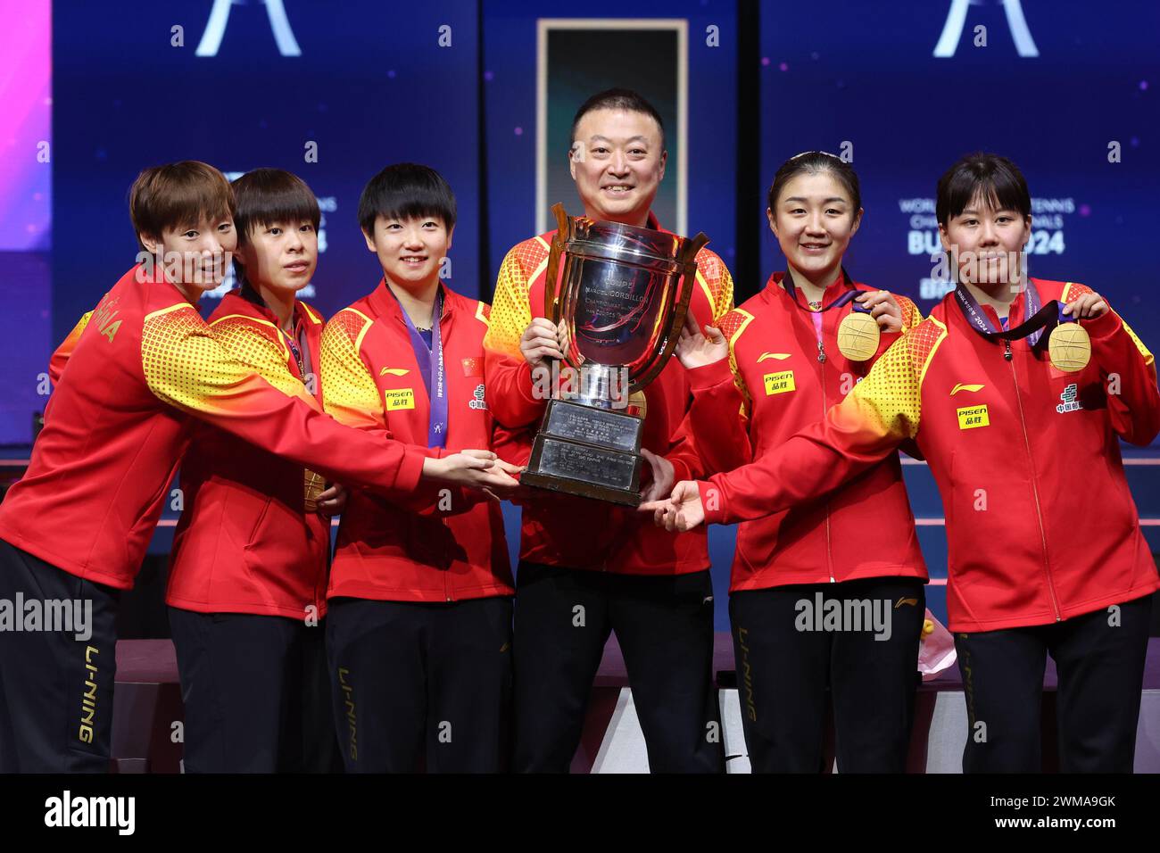 Beijing, South Korea. 24th Feb, 2024. Gold medalists team China pose with the trophy during the ...