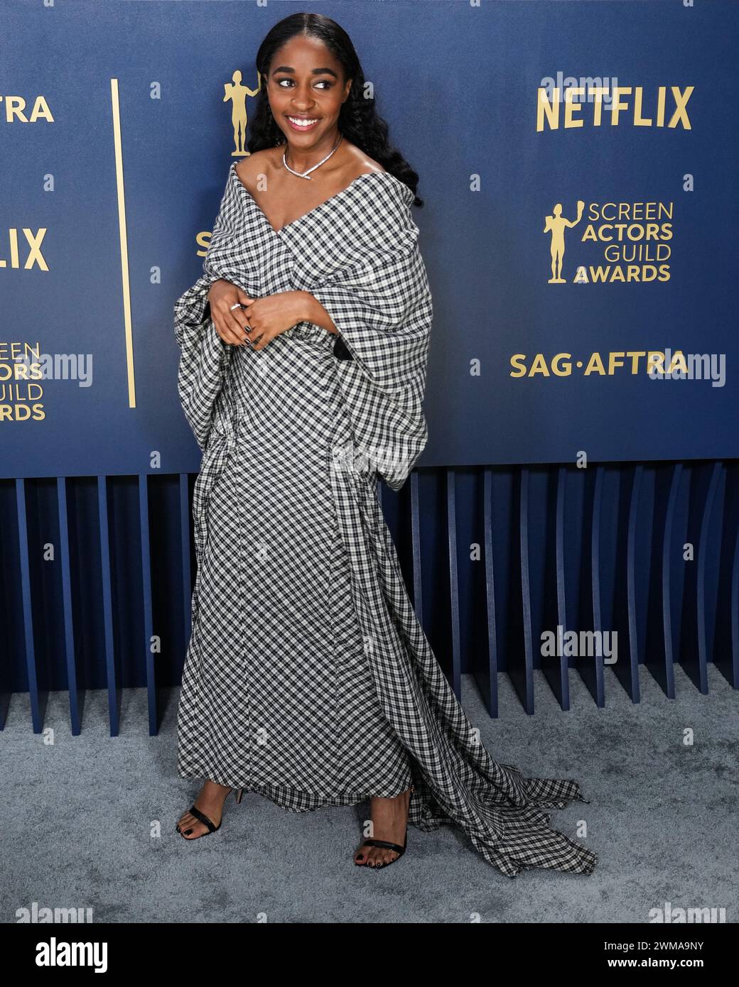 Los Angeles, USA. 24th Feb, 2024. Ayo Edebiri walking on the red carpet ...
