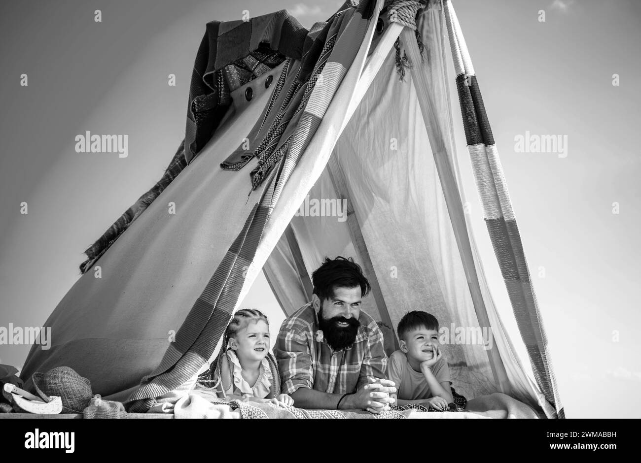 Father with kids children in tent. Summer outdoor vacation. Family ...