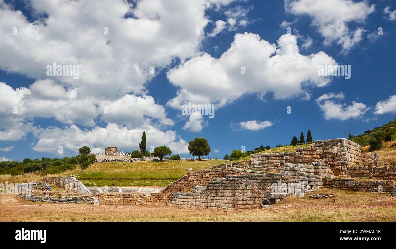 Historic remains of walls under a vibrant sky, surrounded by natural ...